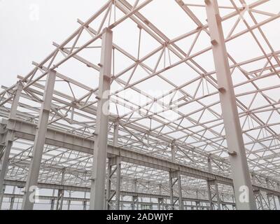 Truss ceiling and metal pillars and girders. Support constructions ...