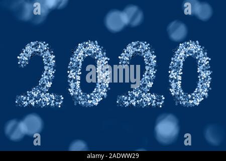 Golden stars sparkles shaped 2020 on dark background Stock Photo - Alamy