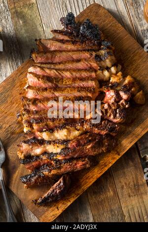 Homemade Grilled Sugar Steak with Potatoes and Peas Stock Photo - Alamy