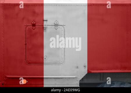 Peru flag depicted on side part of military armored truck close up ...