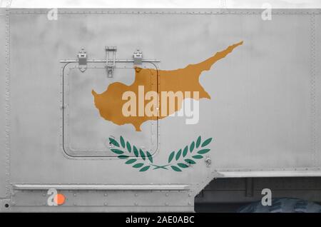 Cyprus flag depicted on side part of military armored tank close up ...