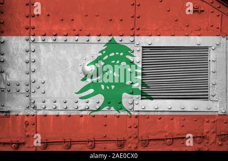 Lebanon flag depicted on side part of military armored helicopter close ...