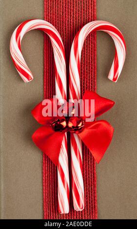 Two candies canes striped in Christmas colours. Isolated Stock Photo ...