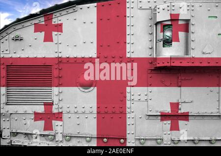 Georgia flag depicted on side part of military armored truck close up ...