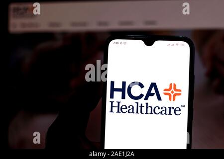 In this photo illustration, a HCA Healthcare logo is seen displayed on ...