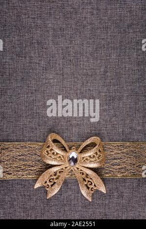 Burlap bow with gold glitter on white background, Christmas holiday ...