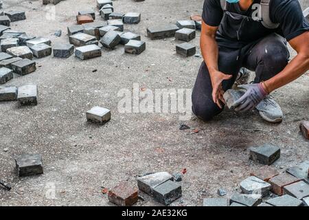 HongKong - November, 2019: Protester blocking road with brick stones ...