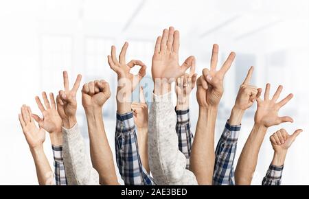 Row of man hands showing various gestures Stock Photo - Alamy