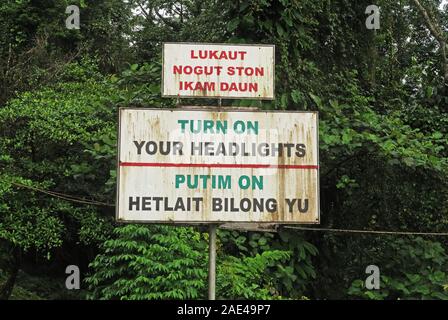 PAPUA NEW GUINEA road sign against clear blue sky Stock Photo - Alamy