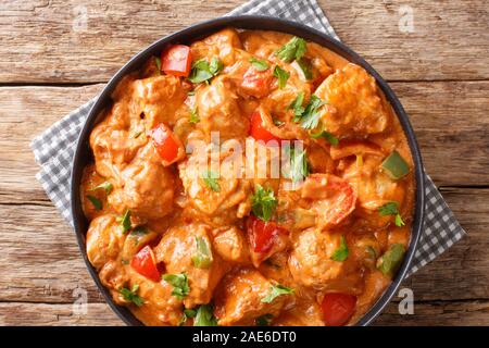 Authentic african chicken mafe in peanut sauce, with tomatoes, peppers ...