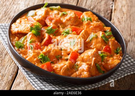 Authentic african chicken mafe in peanut sauce, with tomatoes, peppers ...