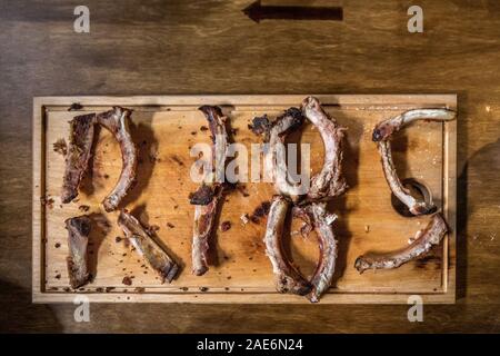 The word ribs are laid out from the gnawed ribs from a restaurant dish ...