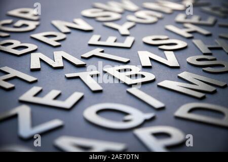 Mixed solid letters pile closeup photo. Education background concept ...