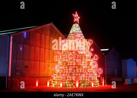 An innovative Christmas Tree, made from pallets of wood. This is ...