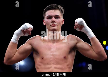 Hopey Price celebrates beating Swedi Mohamed (not pictured) in their ...