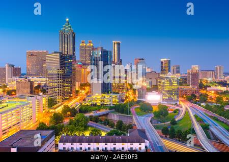 Aerial view above Atlanta, Georgia with fluffy white clouds seen from ...