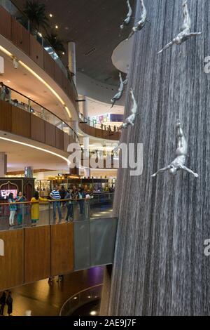 The Dubai Mall. Diving men sculpture, divers diving art statues in The ...