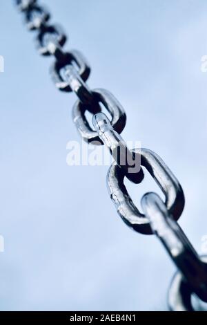 metallic chain and blue sky, minimal background Stock Photo - Alamy