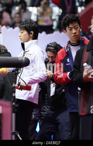Nathan Chen, left, of the United States, celebrates after winning the ...