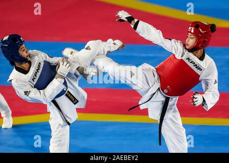 Pauline Lopez of the Philippines competes against Aliza Chhoeung of ...