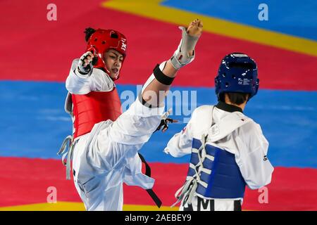 Pauline Lopez of the Philippines competes against Aliza Chhoeung of ...