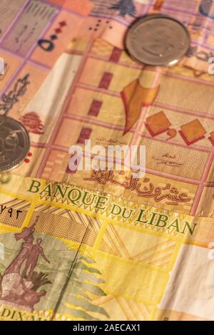 A composition of Lebanese lira LL. Lebanese pound LBP banknotes and ...