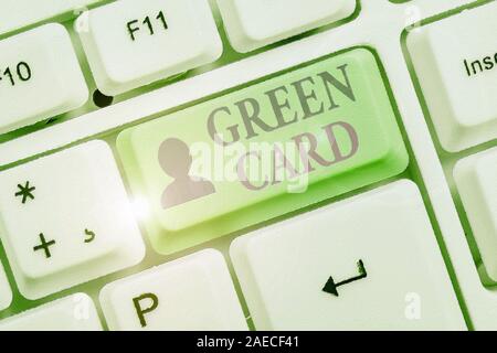 Writing note showing Green Card. Business concept for permit allowing a ...
