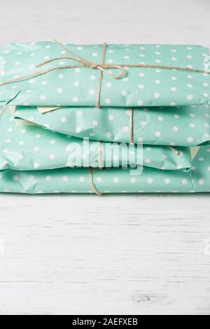 Packed birthday present on wooden board holidays concept Stock Photo ...