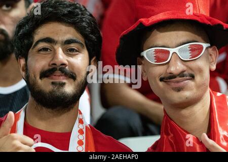 Saudi Arabian fans cheering for their team during its 2-1 group stage ...
