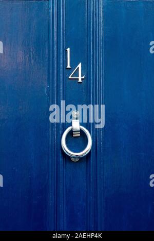 House number 14 on an old brown wooden front door Stock Photo - Alamy