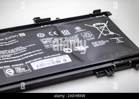 Lithium-ion laptop battery that has swollen Stock Photo - Alamy
