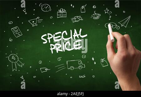 Hand drawing SPECIAL PRICE inscription with white chalk on blackboard ...
