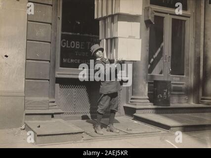 Photograph by Lewis Hine around 1914 showing a wagon boy, also known as ...