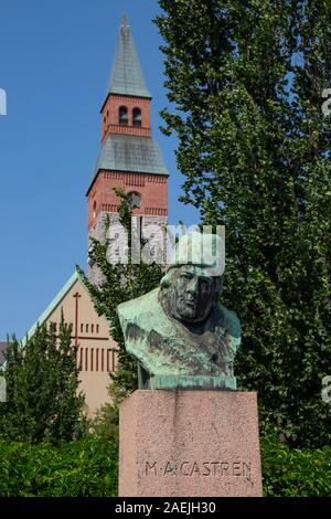 Statue of M A Castren with National Museum of Finland in Helsinki Stock ...