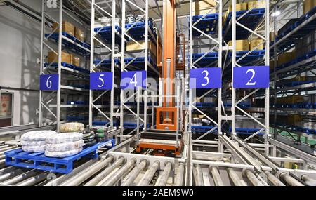 An auto piler works in the chemical plant in Luoyang city, central ...