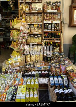 Bottles of Limoncello and Meloncello in a shop window in the town of ...