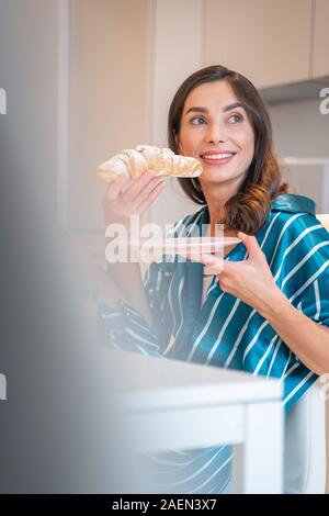 Photo of happy positive dreamy cheerful african woman looking copyspace ...