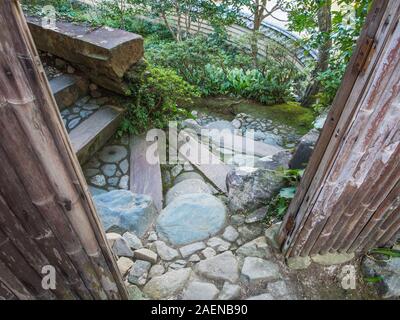 Japanese garden with stone path in a private garden Stock Photo - Alamy