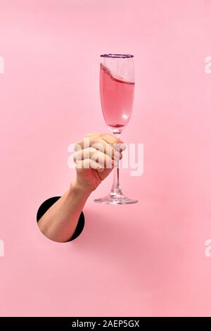 Woman holds single pink rose. Romantic flower ornament with rose ...