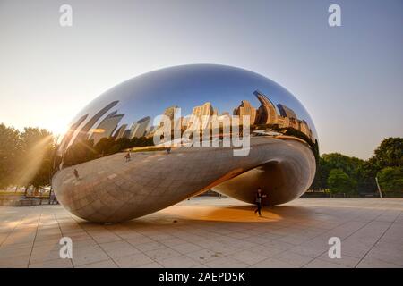 The Cloud Gate sculpture also known as "the bean" in Millennium park ...