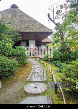 Tobi-ishi stepping stone path with nanako gaki bamboo fence in the ...
