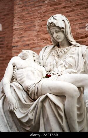 Marble statue with red rose Stock Photo - Alamy