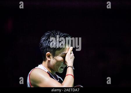 Chou Tien-chen of China Taiwan competes against Kento Momota of Japan ...