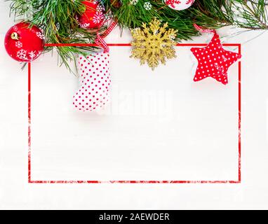 Winter frame with Snowflakes and fir tree branches with copy space for ...