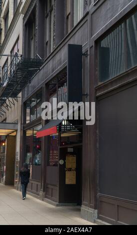 Generic restaurant bar exterior establishing shot facade on city street ...