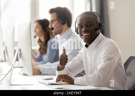African american call operator in headset. Call center business or ...