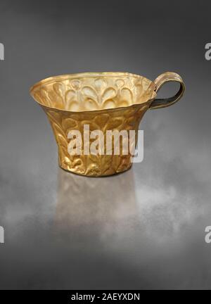 Mycenaean gold cup with horizontal grooves found buried in Grave IV ...