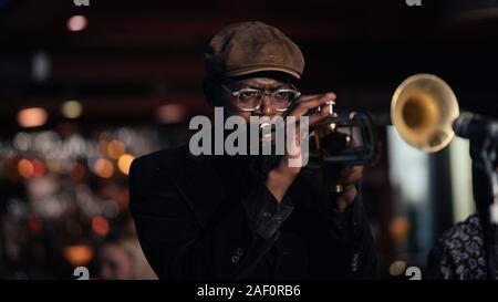 Mark Kavuma with his trumpet Stock Photo - Alamy