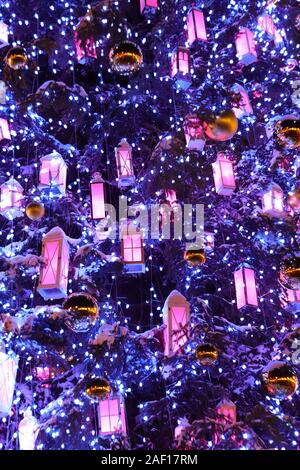 Blue and pink Christmas balls and Christmas lights Stock Photo - Alamy