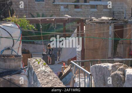 Jewish children playing on the streets of the old city in the Jewish ...